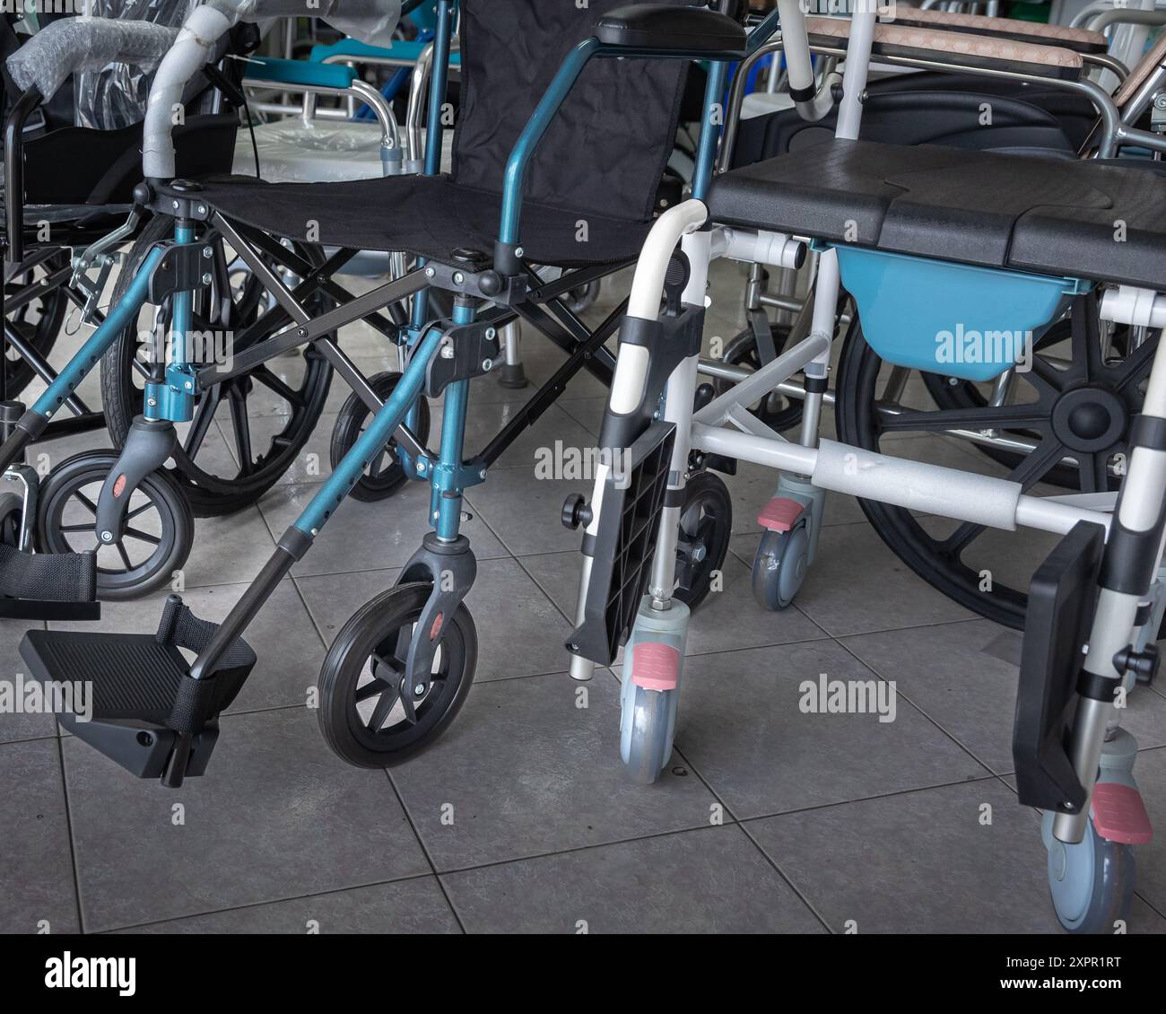 Wheelchairs on display in the store. Brand new modern design wheel ...