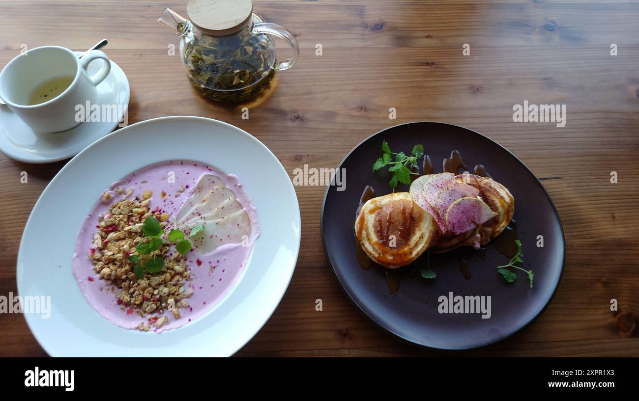 Yogurt and cereal smoothie with pear chunks, and pancakes with maple ...