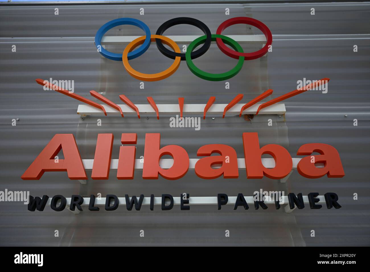 Alibaba's logo and the Olympic Rings are pictured in Paris, France, on ...