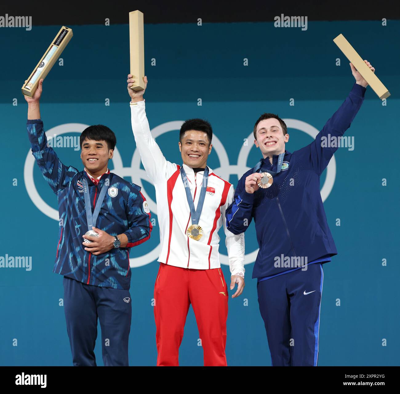 Paris, France. 7th Aug, 2024. Gold medalist Li Fabin (C) of China ...