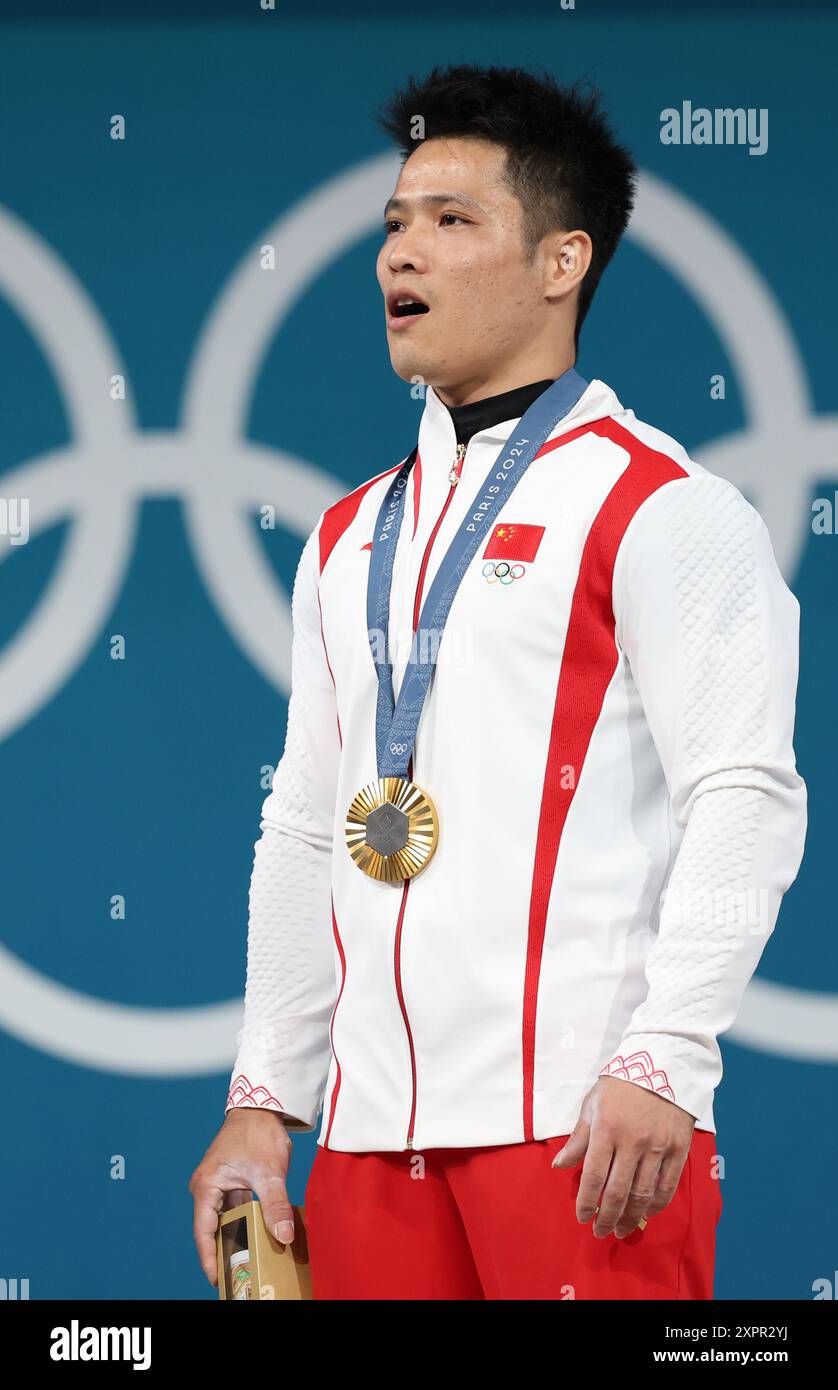 Paris, France. 7th Aug, 2024. Gold medalist Li Fabin of China sings ...