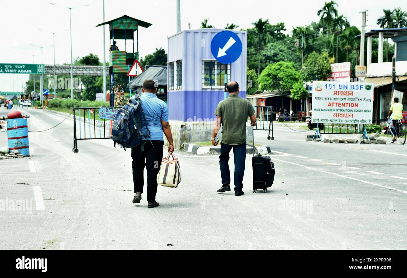 Siliguri, West Bengal, India. 7th Aug, 2024. A family of Bangladesh ...