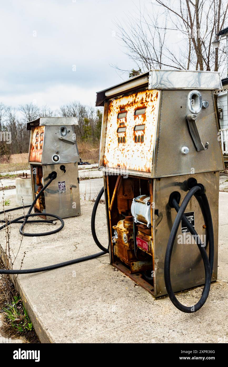 Old broken fuel pumps at abandoned petrol station Stock Photo - Alamy