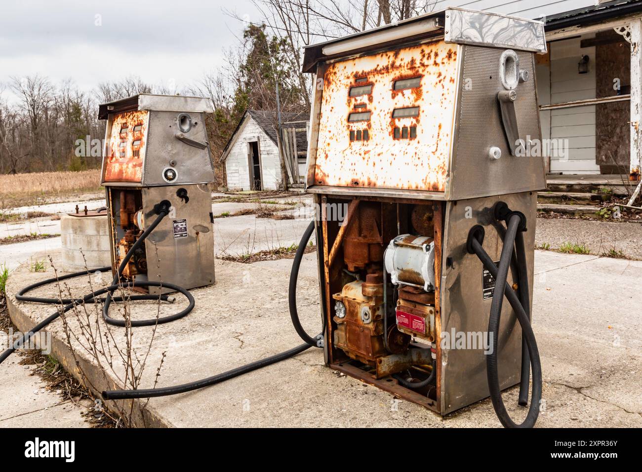 Old broken fuel pumps at abandoned petrol station Stock Photo - Alamy