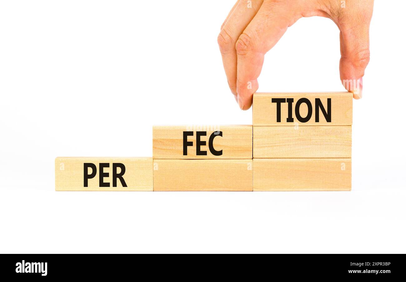 Perfection symbol. Concept word Perfection on beautiful wooden blocks ...