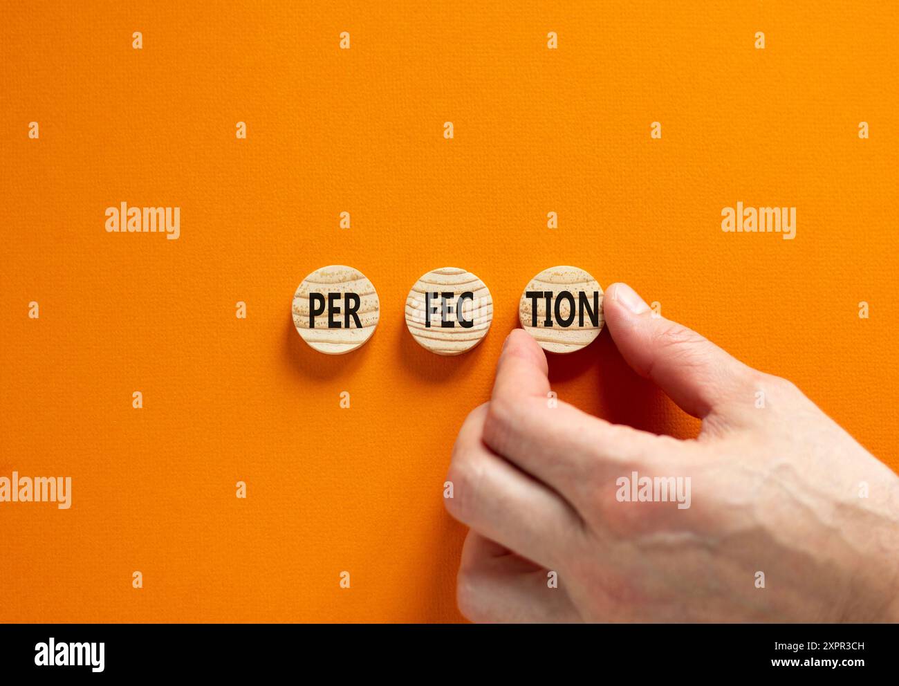 Perfection symbol. Concept word Perfection on beautiful wooden circles ...