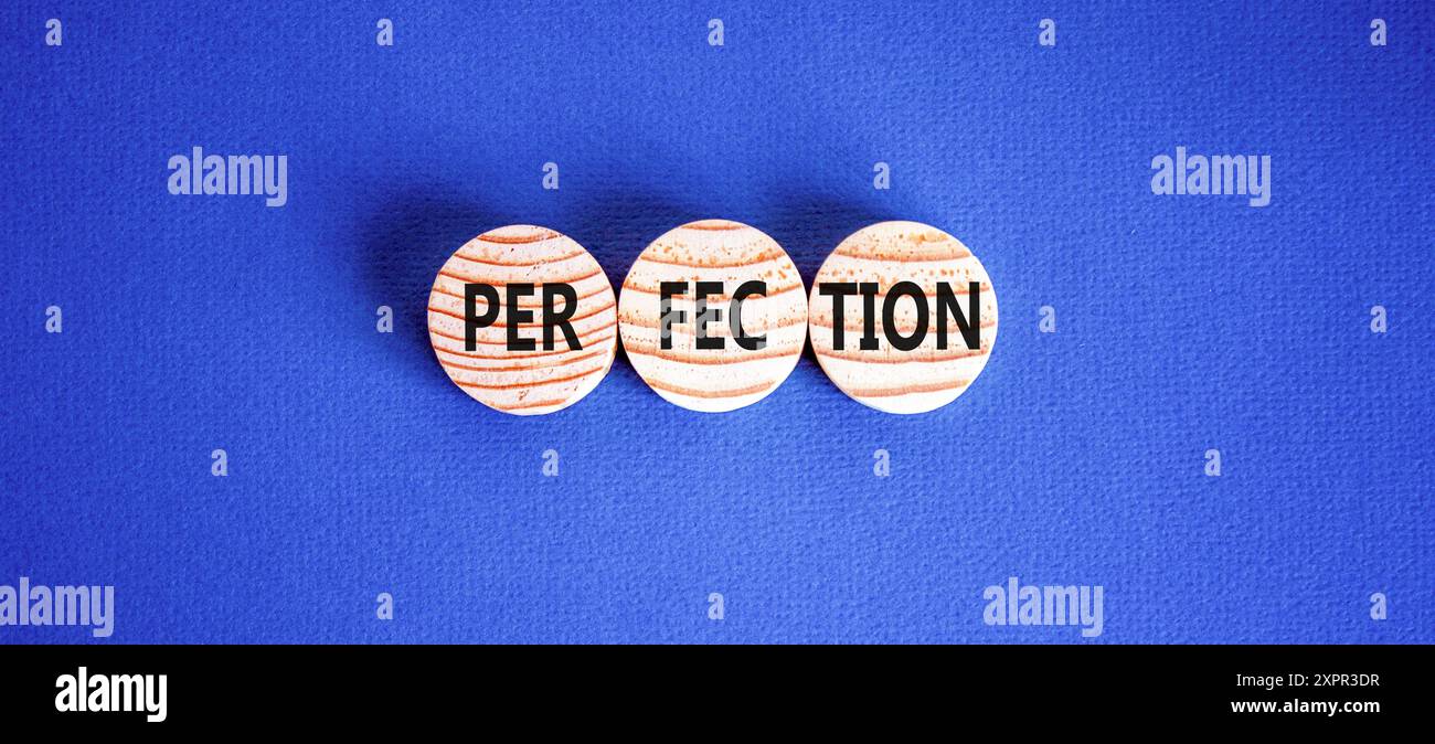 Perfection symbol. Concept word Perfection on beautiful wooden circles ...
