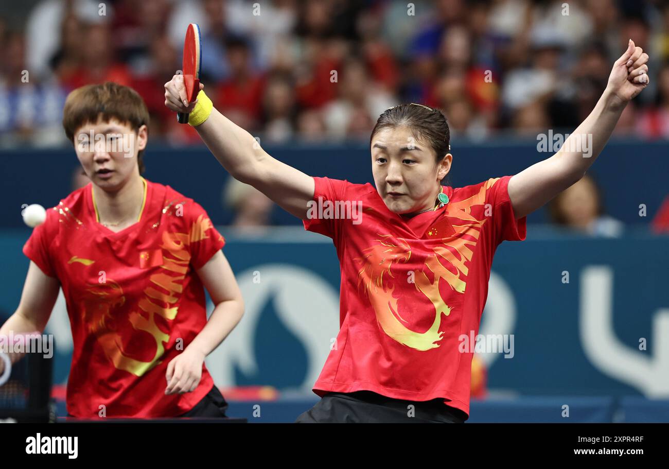 Paris, France. 7th Aug, 2024. Chen Meng (R)/Wang Manyu of China compete ...