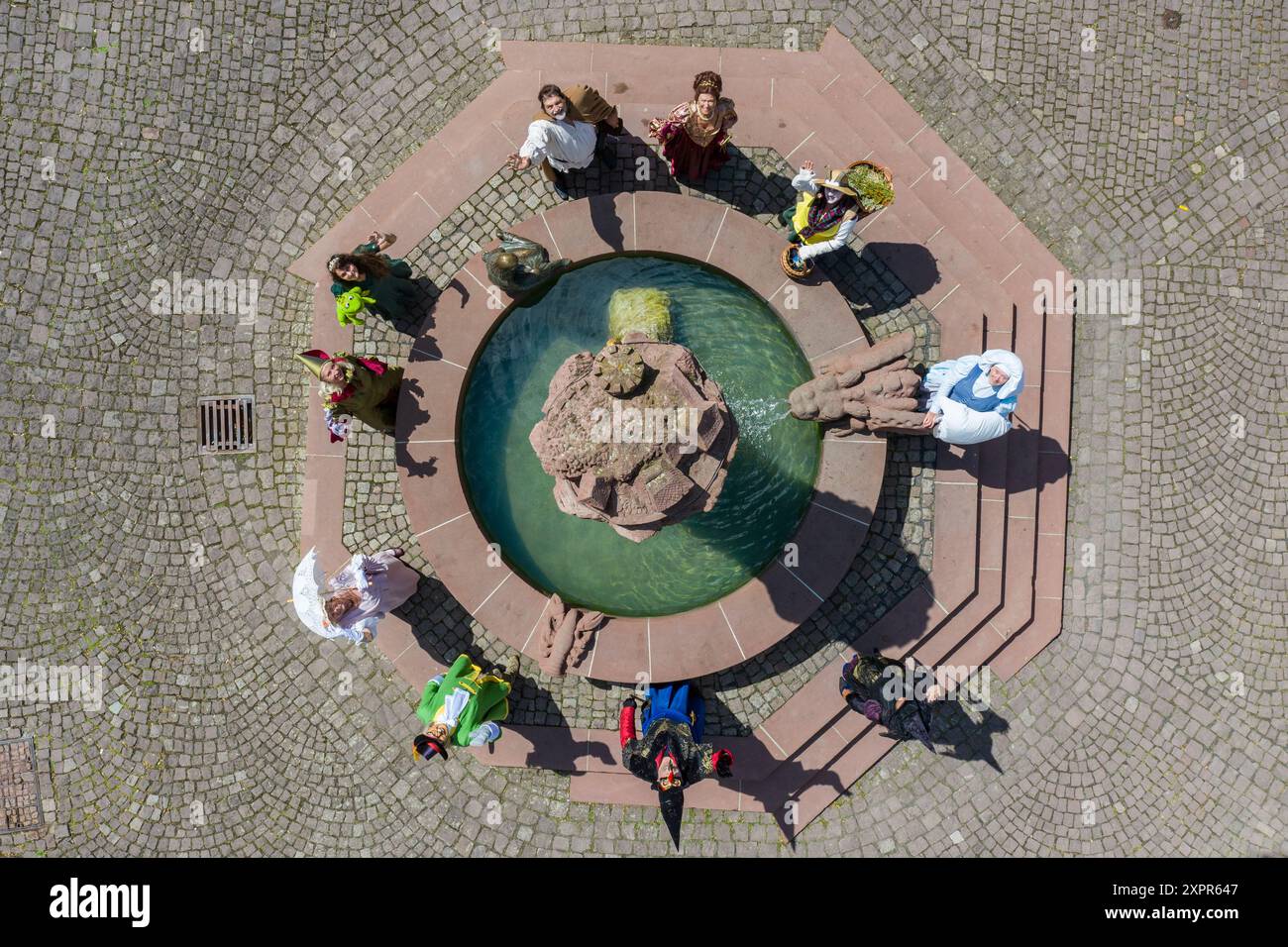 Aerial view of the fairy tale characters of the Brothers Grimm standing ...