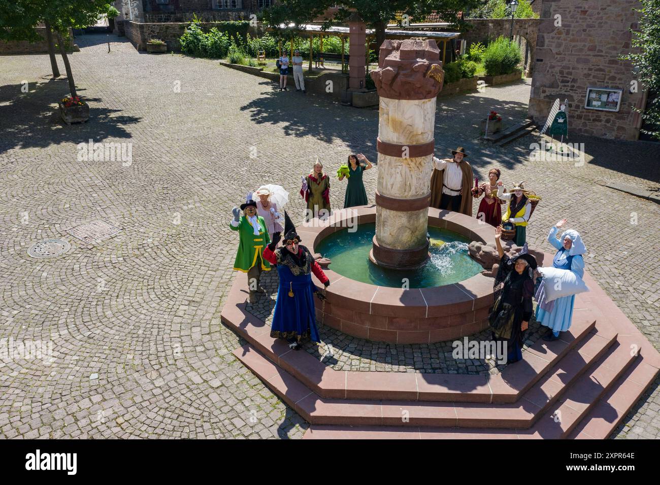 Aerial view of the fairy tale characters of the Brothers Grimm standing ...