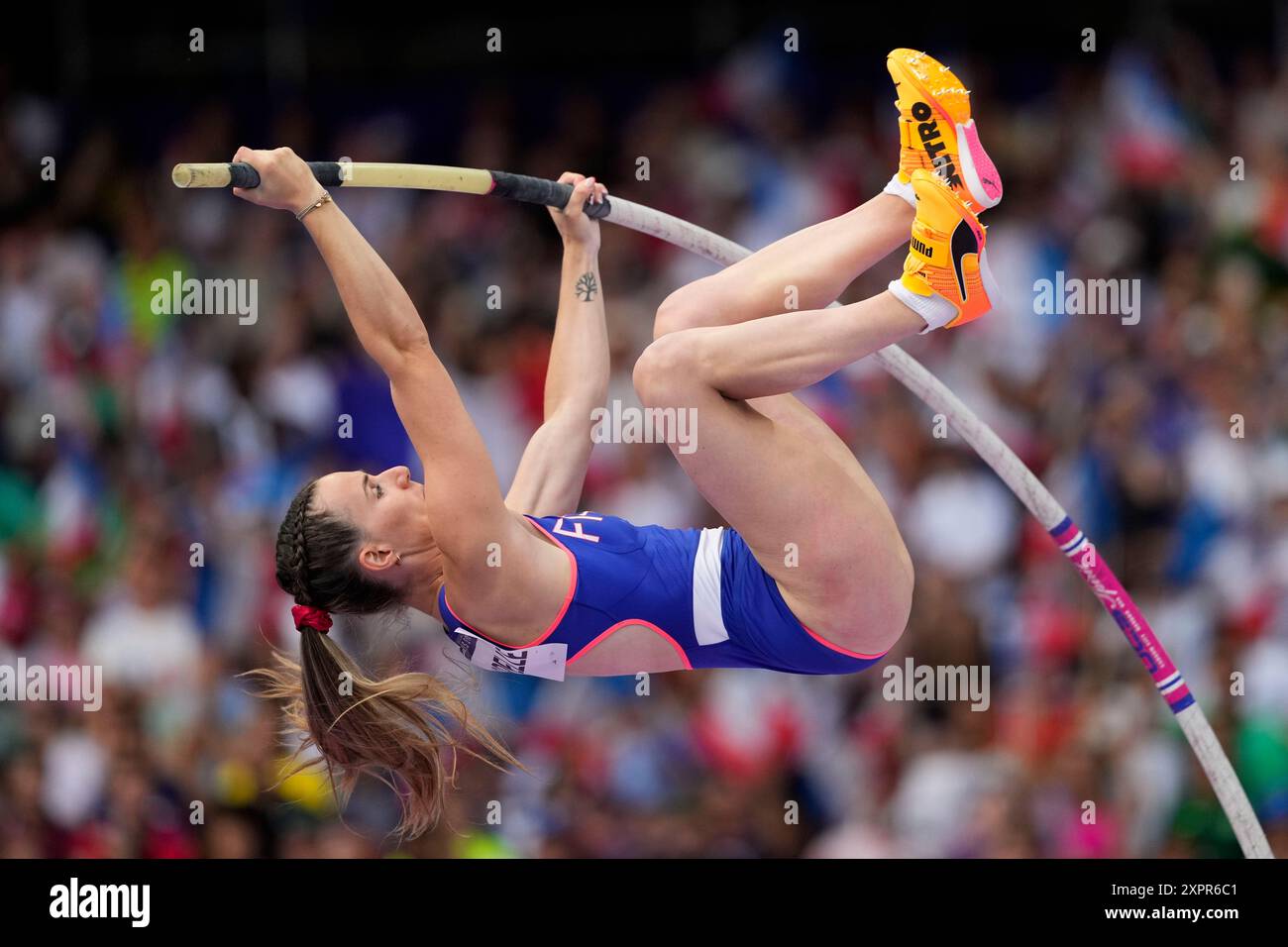 Ninon Chapelle, of France, competes during the women's pole vault final ...