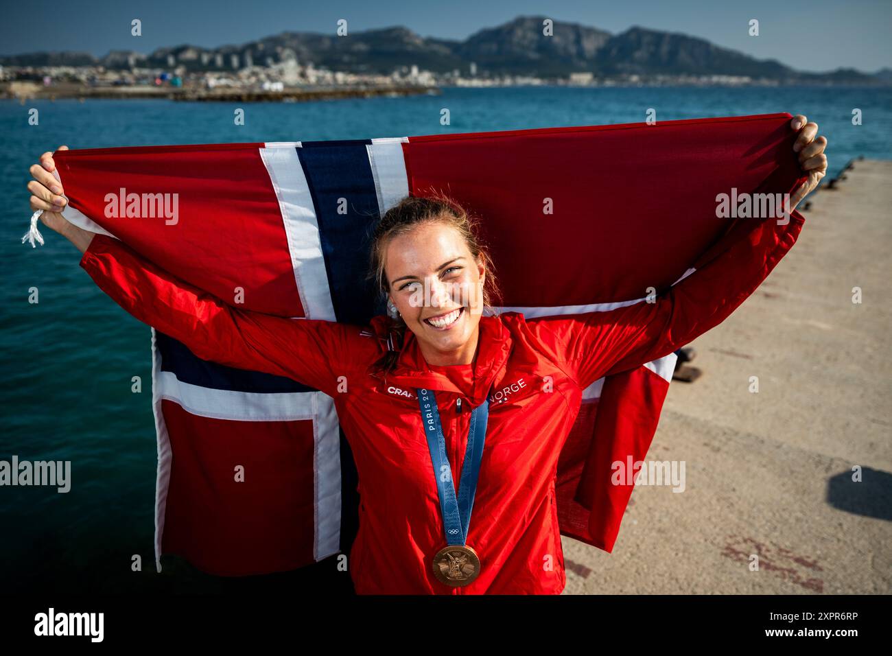 Line Flem Høst of, Norway. , . poses with her bronze medal after the medal ceremony for women's ...