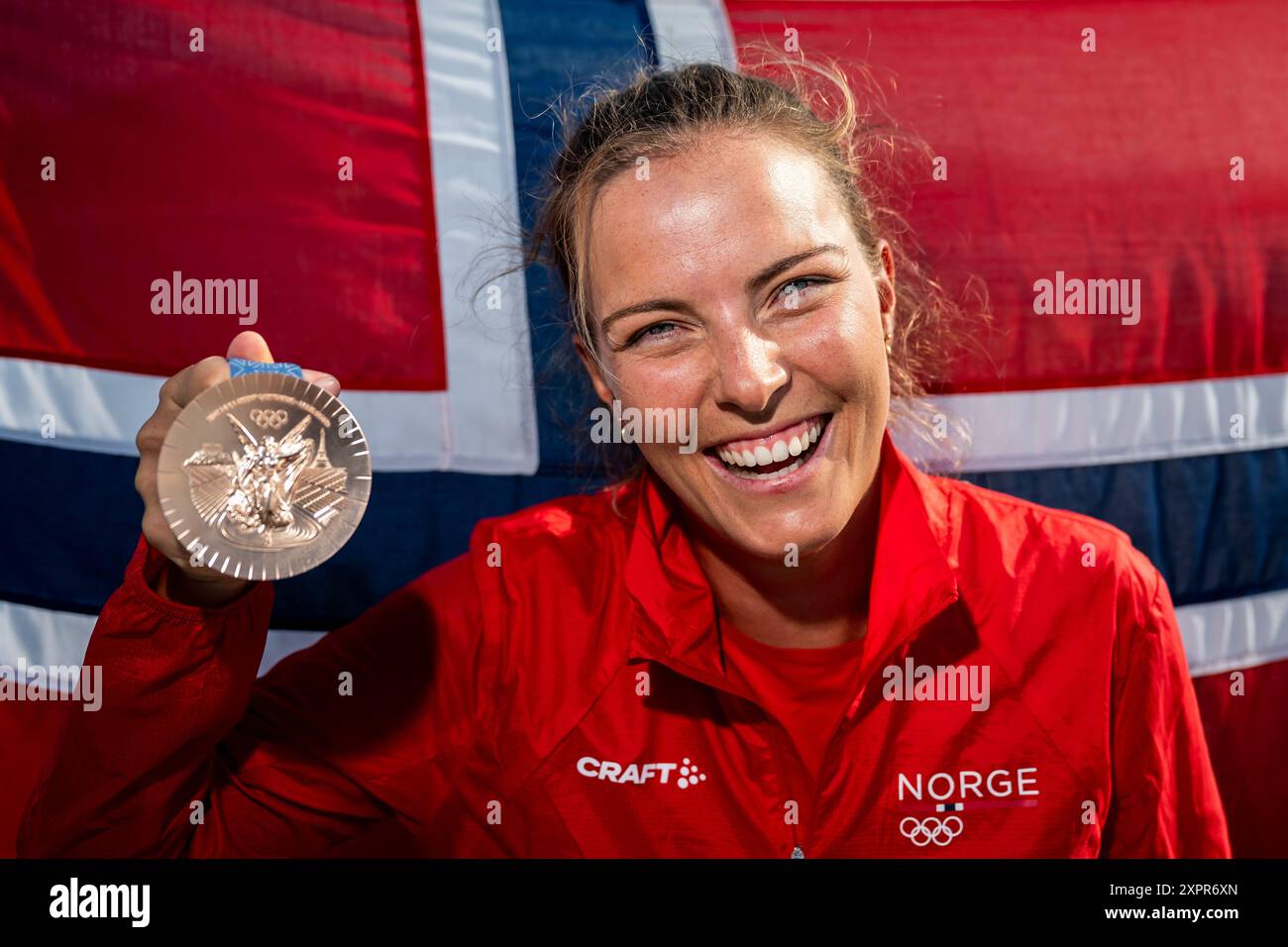 Line Flem Høst of, Norway. , . poses with her bronze medal after the medal ceremony for women's ...
