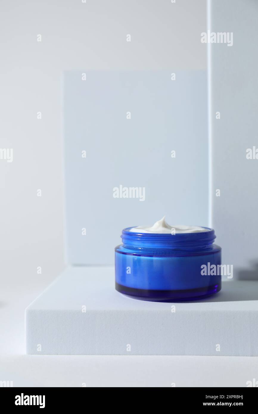 Stylish presentation of facial cream on white background Stock Photo ...