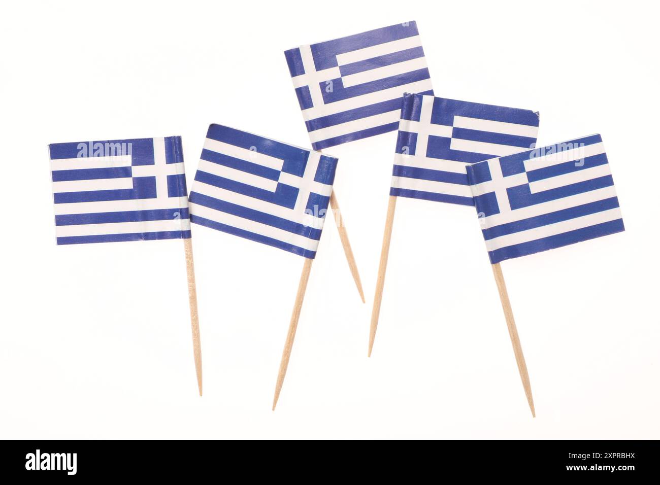 Small paper flags of Greece isolated on white Stock Photo - Alamy