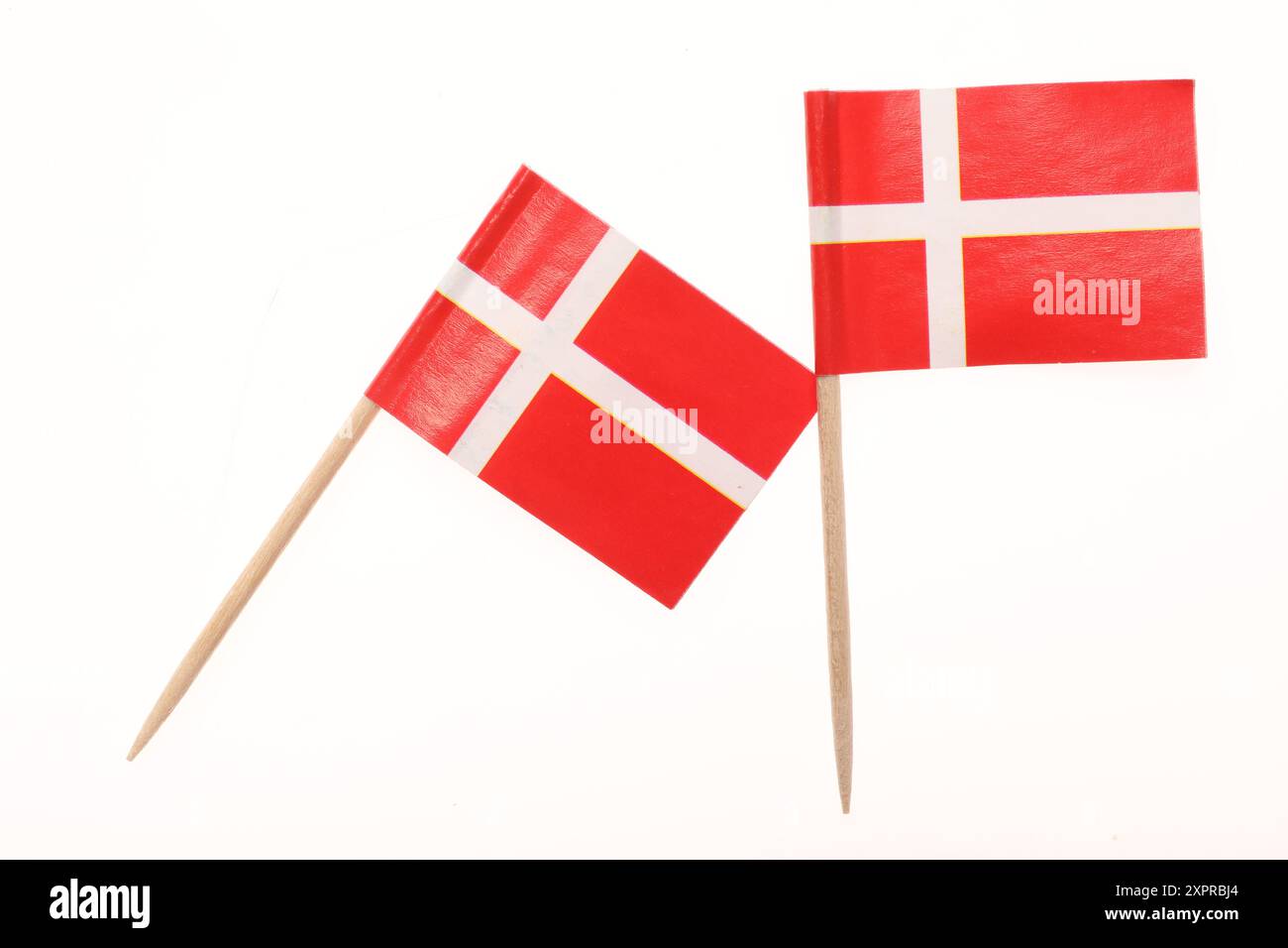 Small paper flags of Denmark isolated on white Stock Photo - Alamy