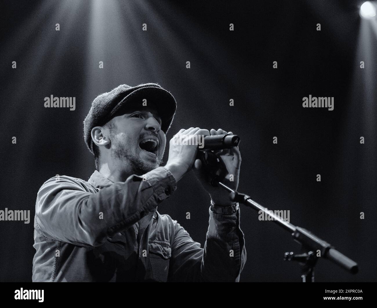 Andy Platts, vocalist with the band Mamas Gun, performing on stage ...