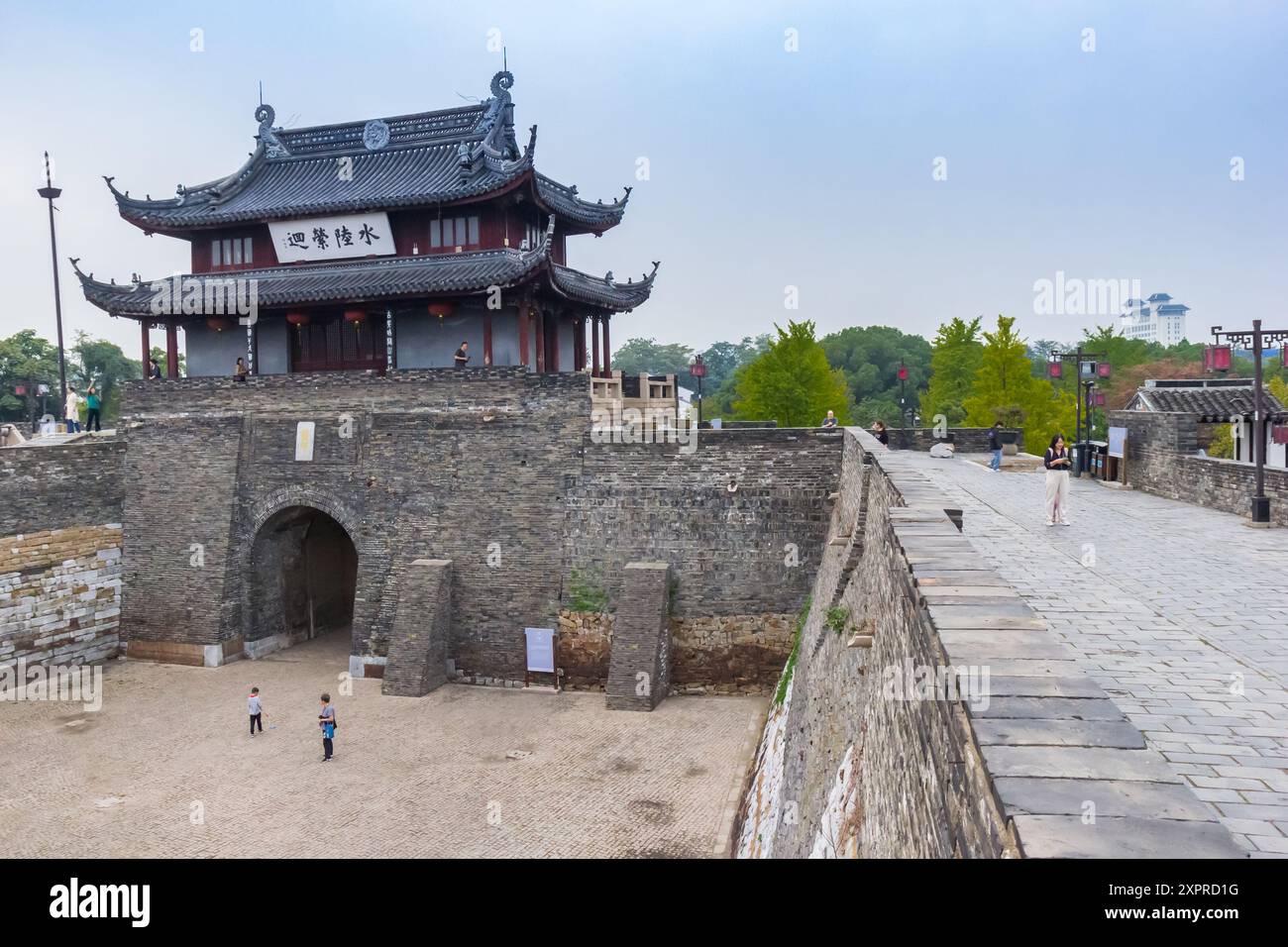 Historic city gate on the surrounding wall of Panmen scenic area in ...