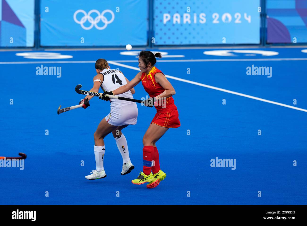China's Ou Zixia, right, and Belgium's Delphine Marien compete for the ...
