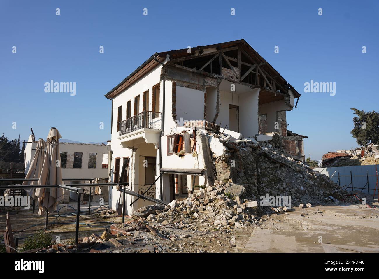 HATAY, TURKIYE - FEBRUARY 26, 2024: Damaged buildings in Hatay City after 6 February 2023 ...