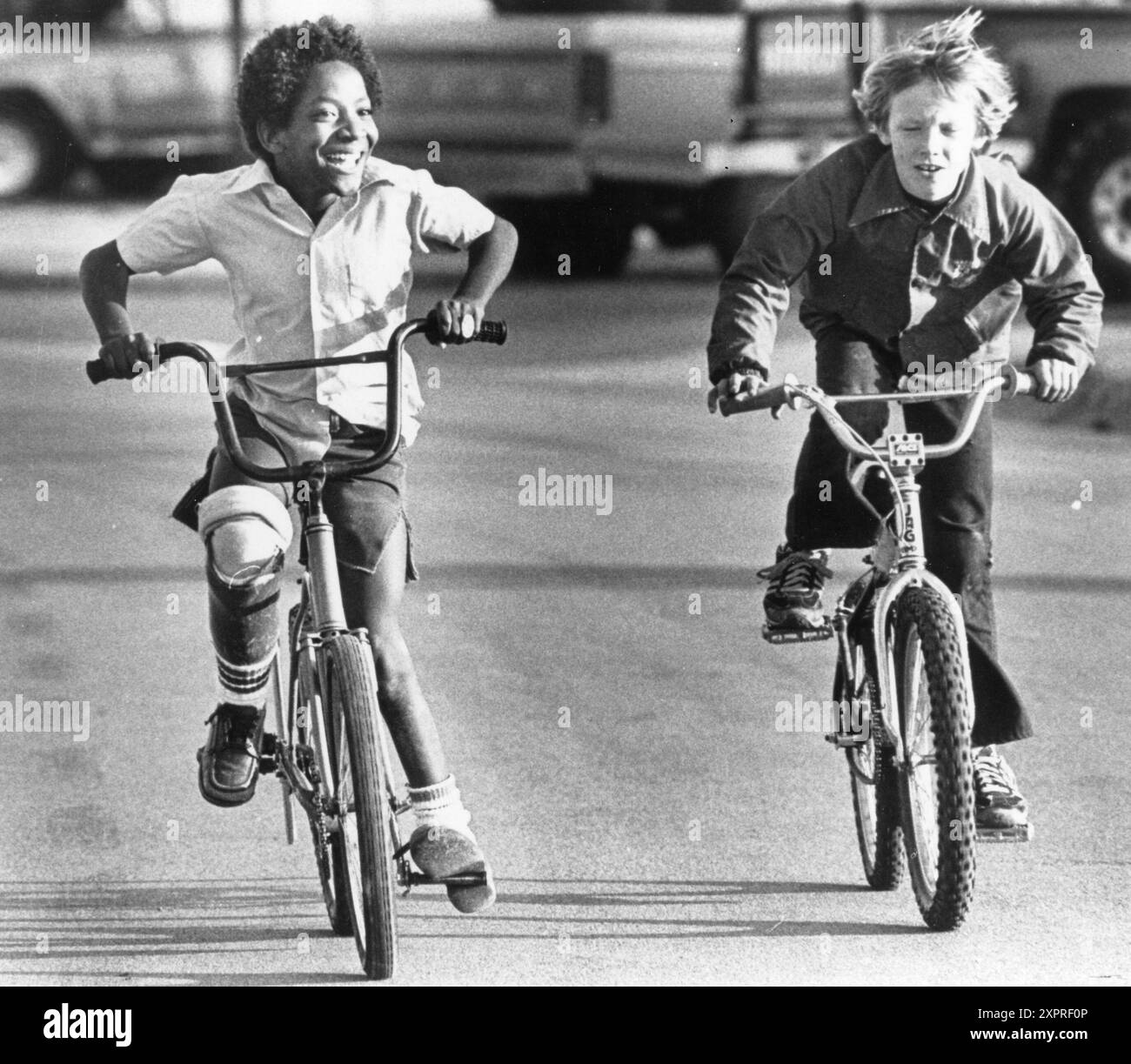 Black boy riding bicycle hi-res stock photography and images - Alamy