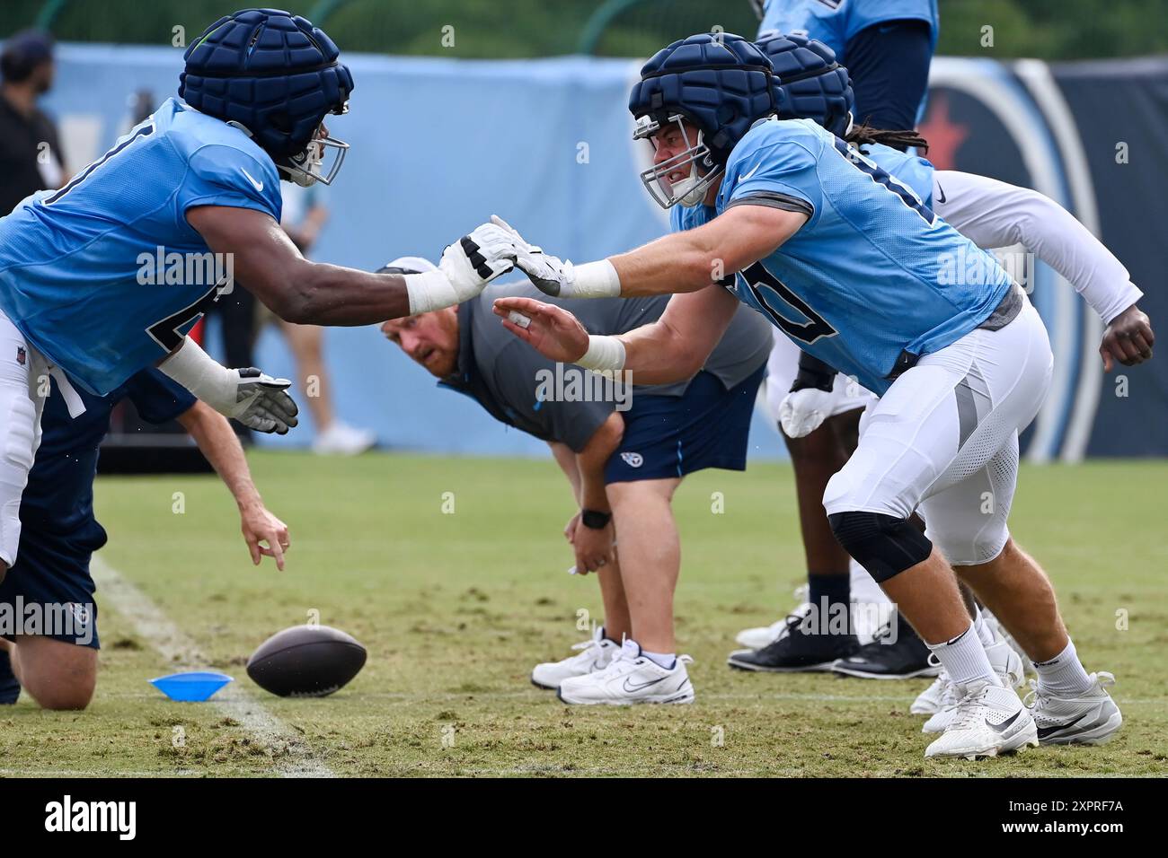 Tennessee Titans offensive lineman Daniel Brunskill, right, competes in ...