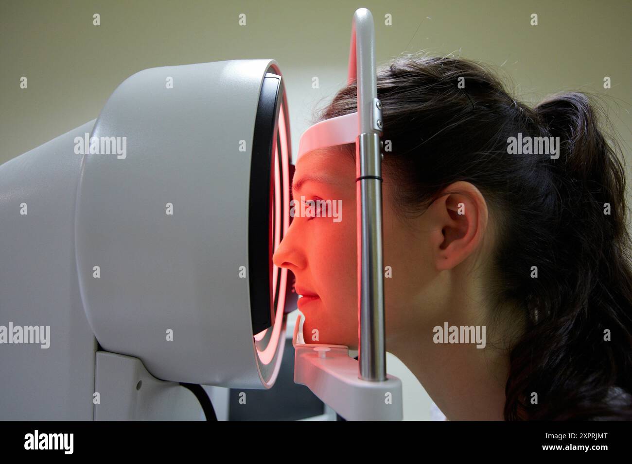 Eye examination Patient having a corneal topography measurement made of ...