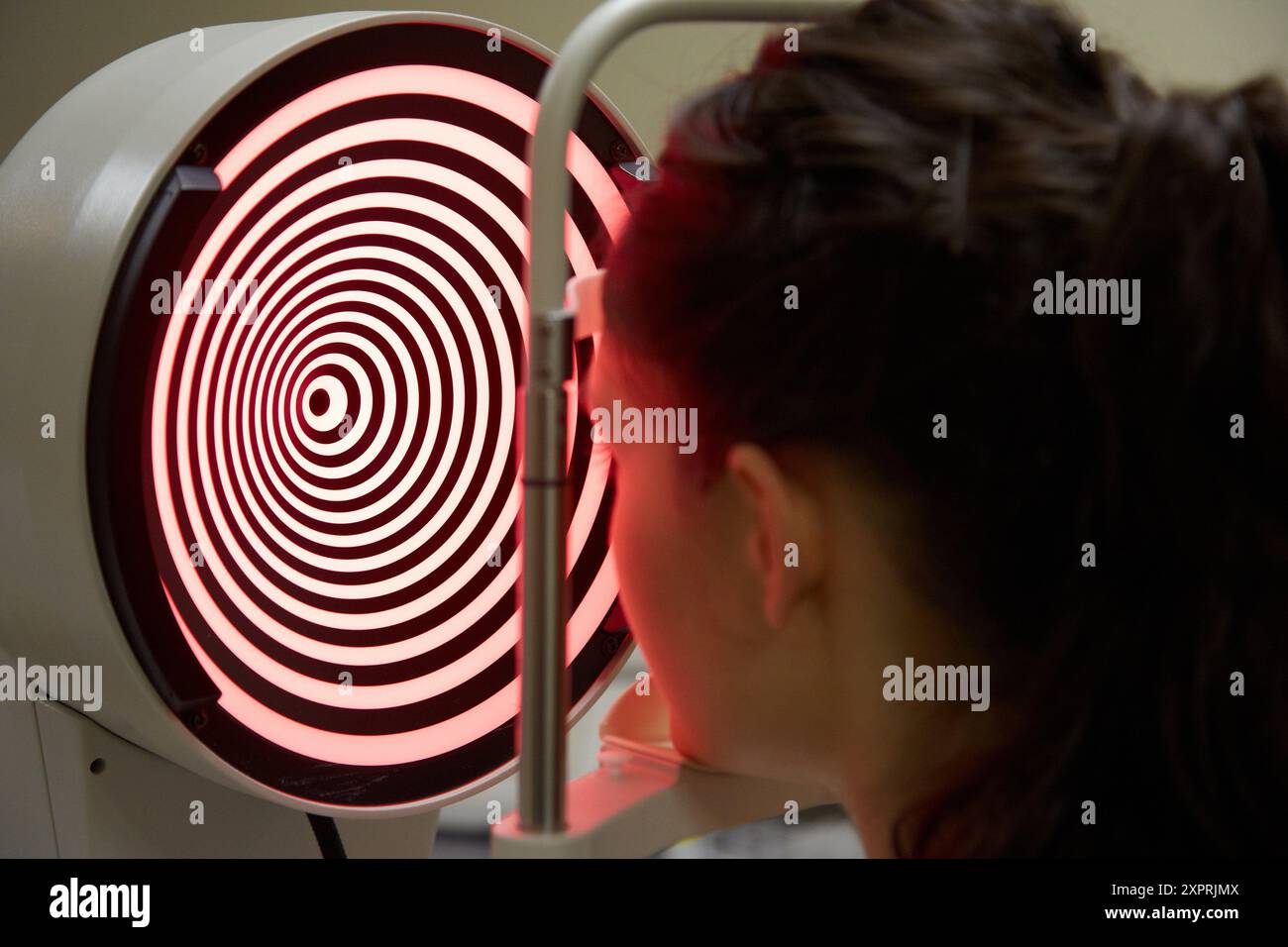 Eye examination Patient having a corneal topography measurement made of ...