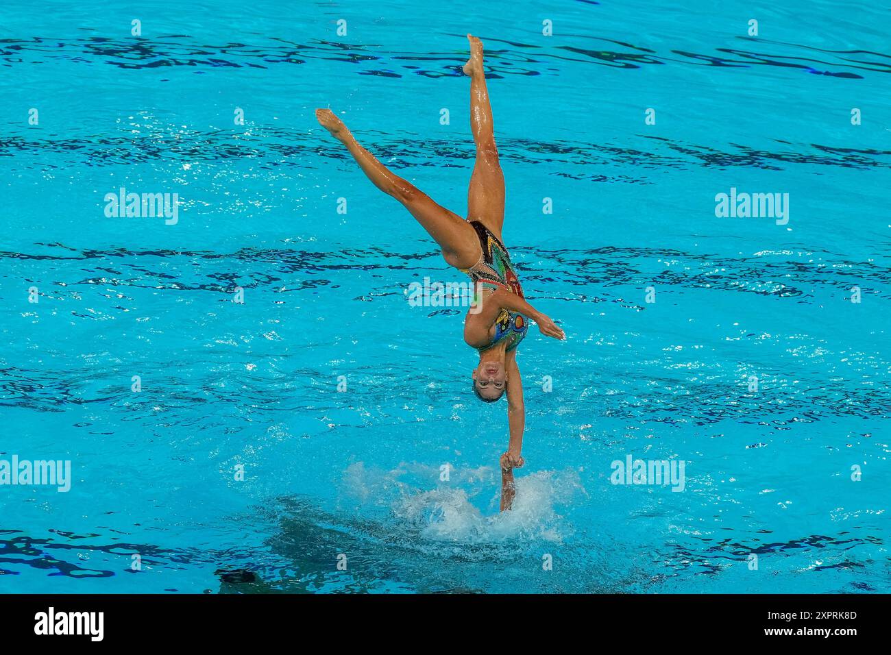 Team Egypt competes in the team acrobatic routine of artistic swimming ...