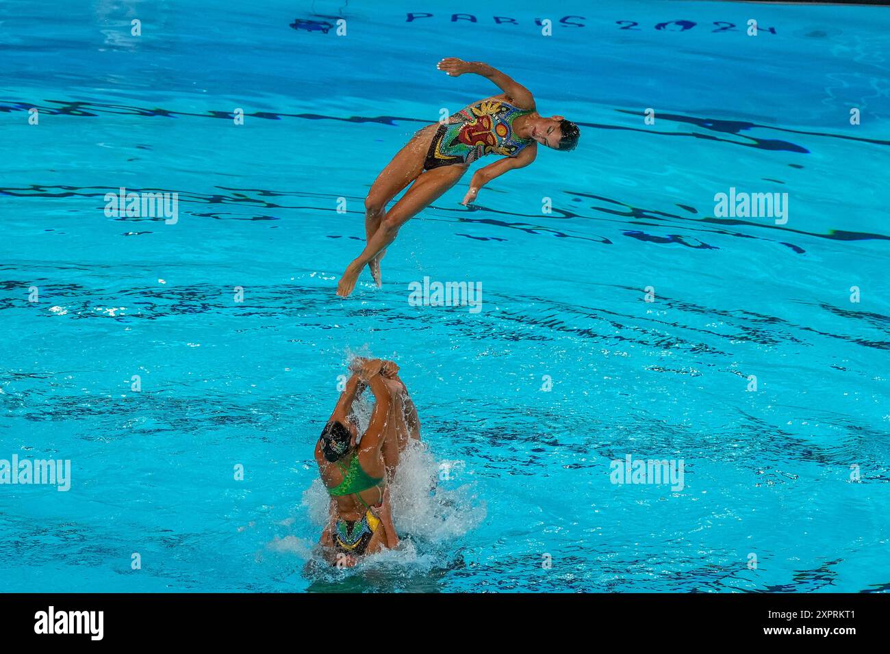 Team Egypt competes in the team acrobatic routine of artistic swimming ...