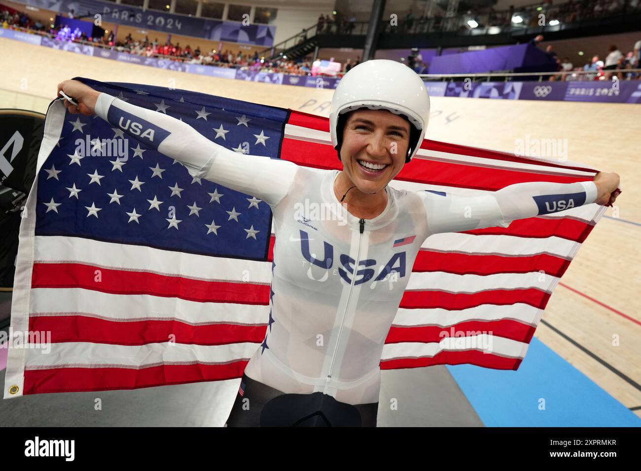 Kristen Faulkner of the United States celebrates winning the gold medal ...