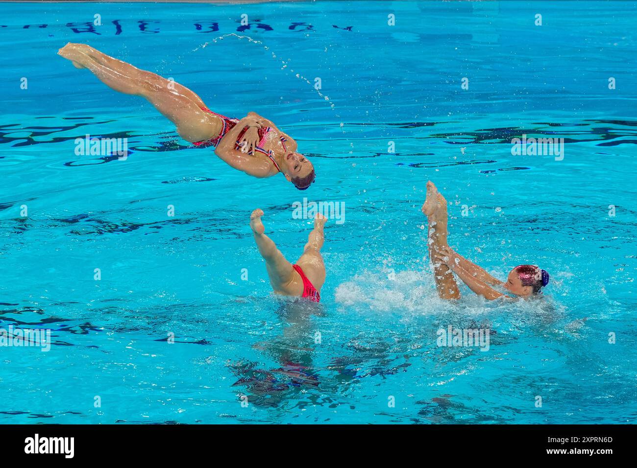 Team France competes in the team acrobatic routine of artistic swimming ...