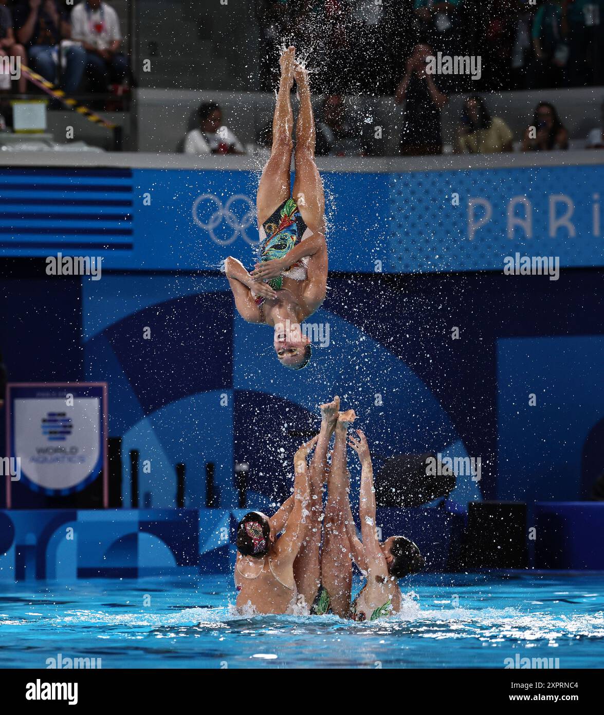 Team Italy swimmers perform during the Artistic Swimming team acrobatic ...