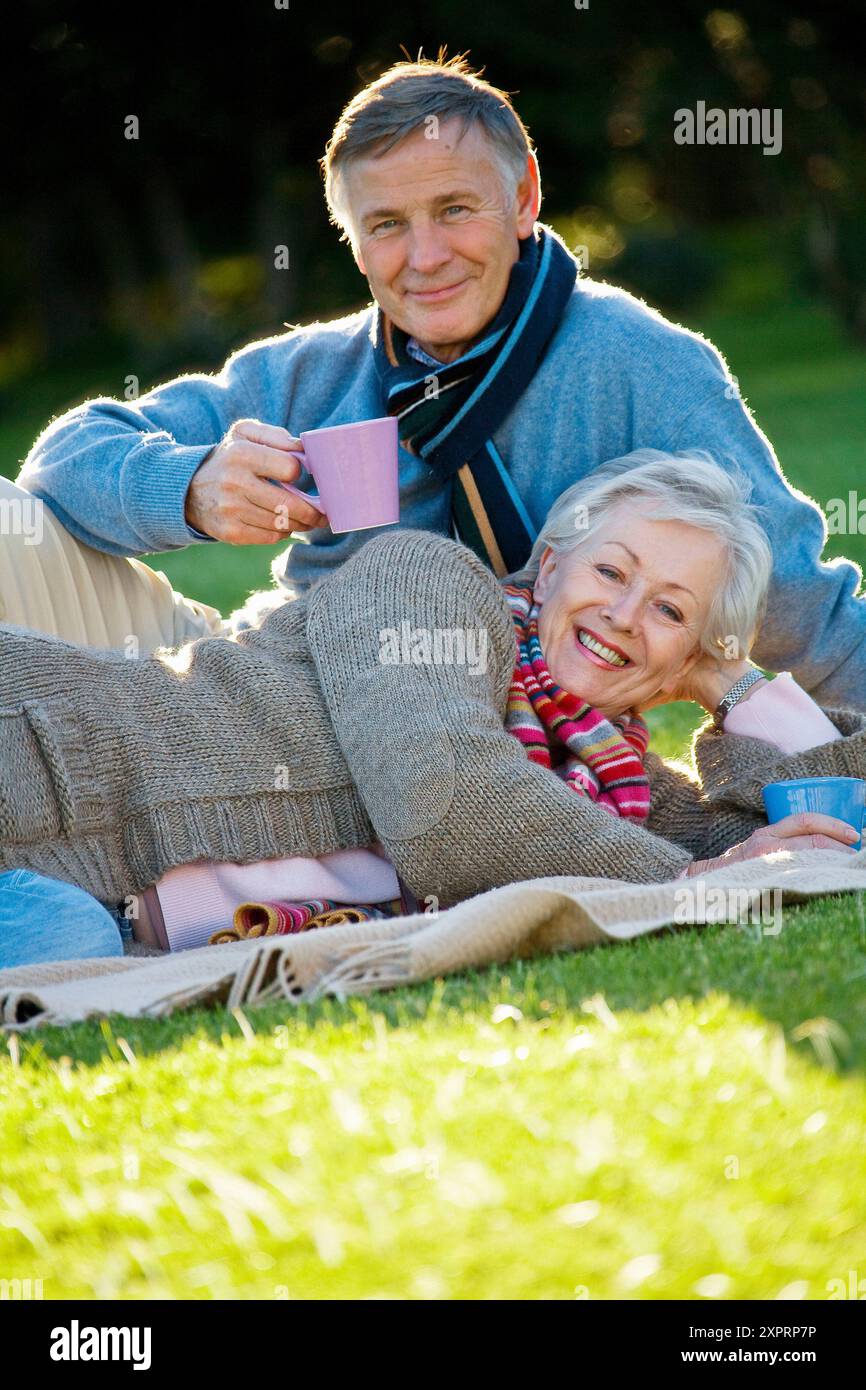 Two mature couples dining outdoor hi-res stock photography and images ...