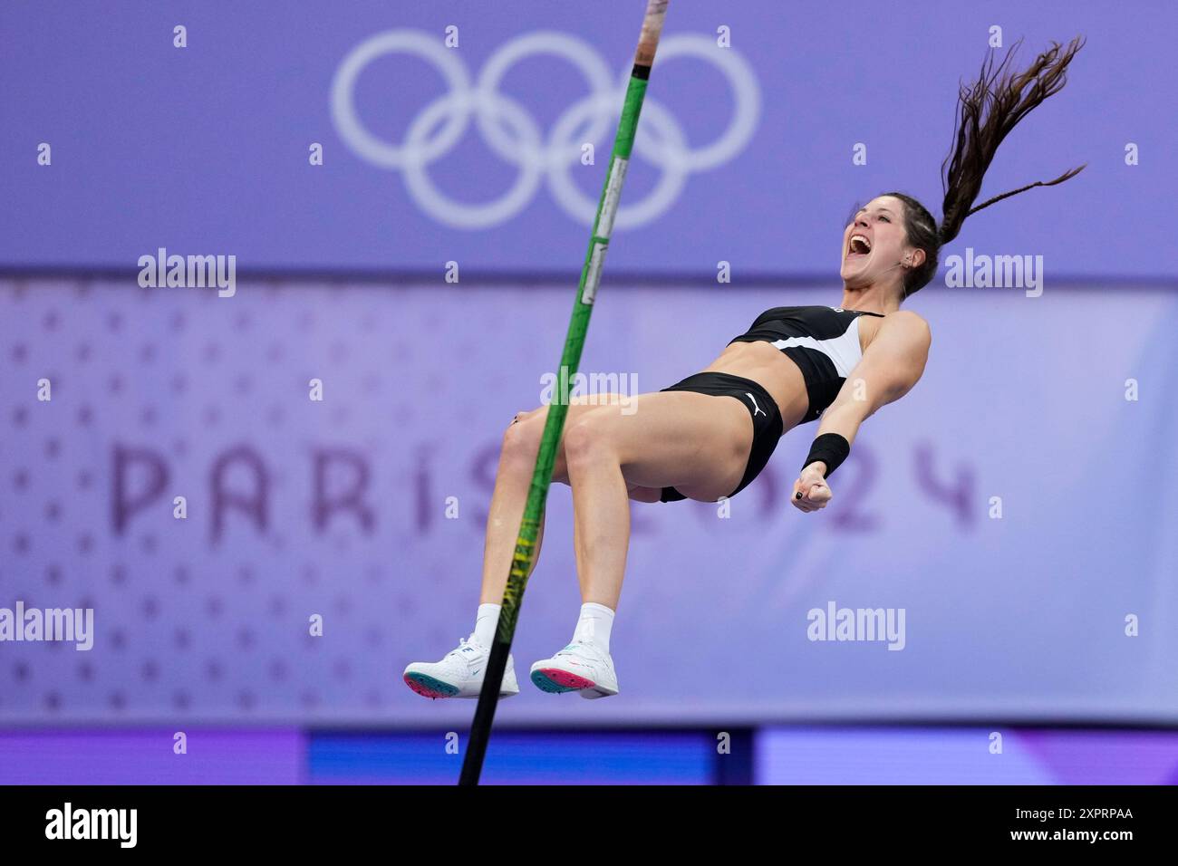 Eliza McCartney, of New Zealand, competes during the women's pole vault ...