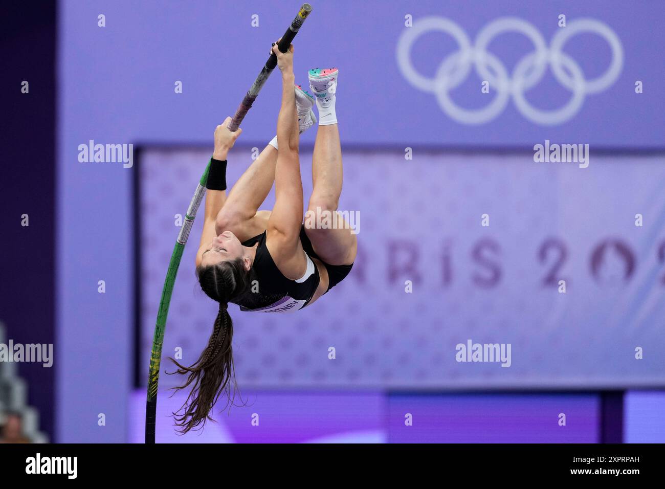 Eliza McCartney, of New Zealand, competes during the women's pole vault ...