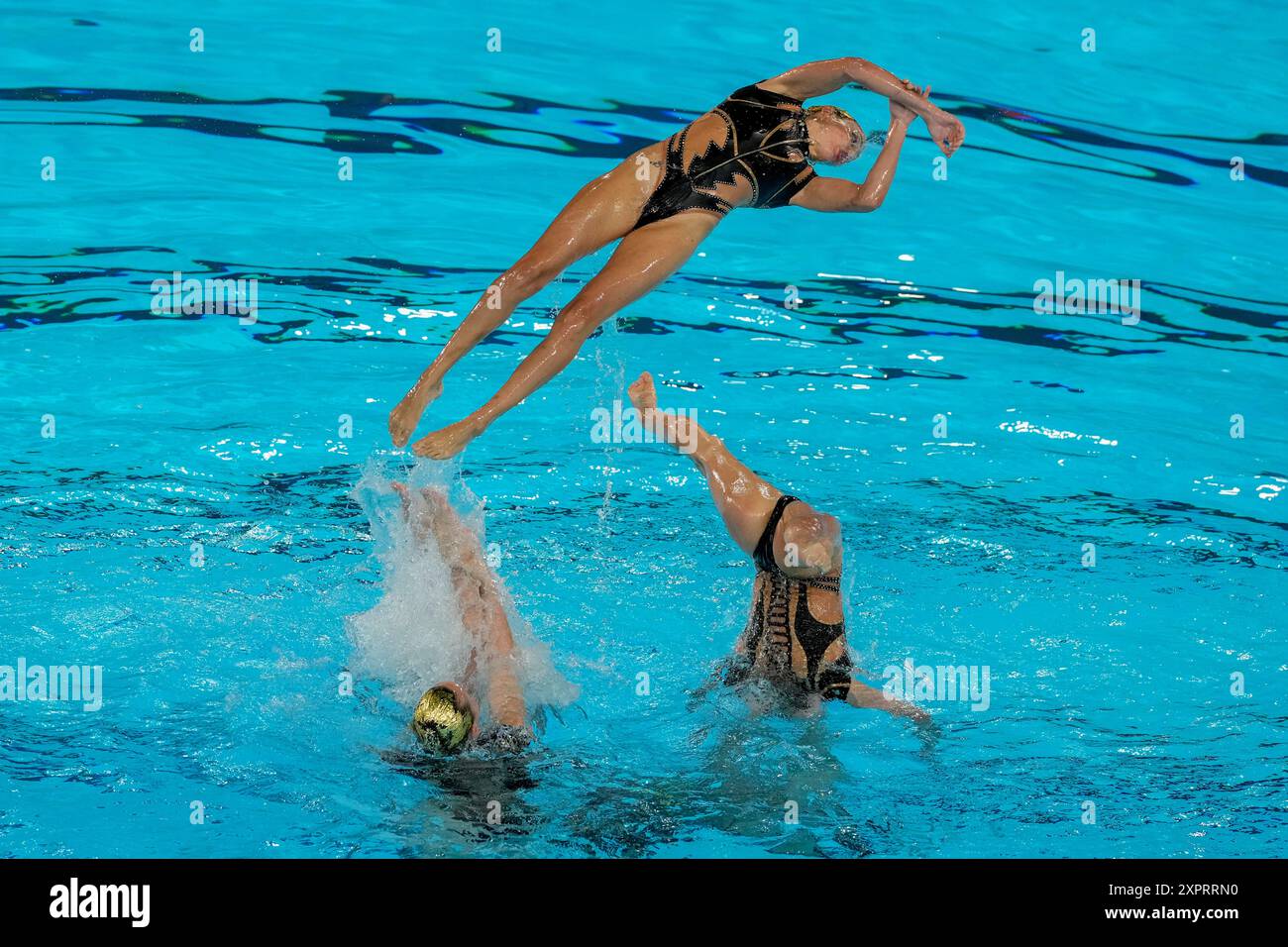 Team Spain competes in the team acrobatic routine of artistic swimming ...