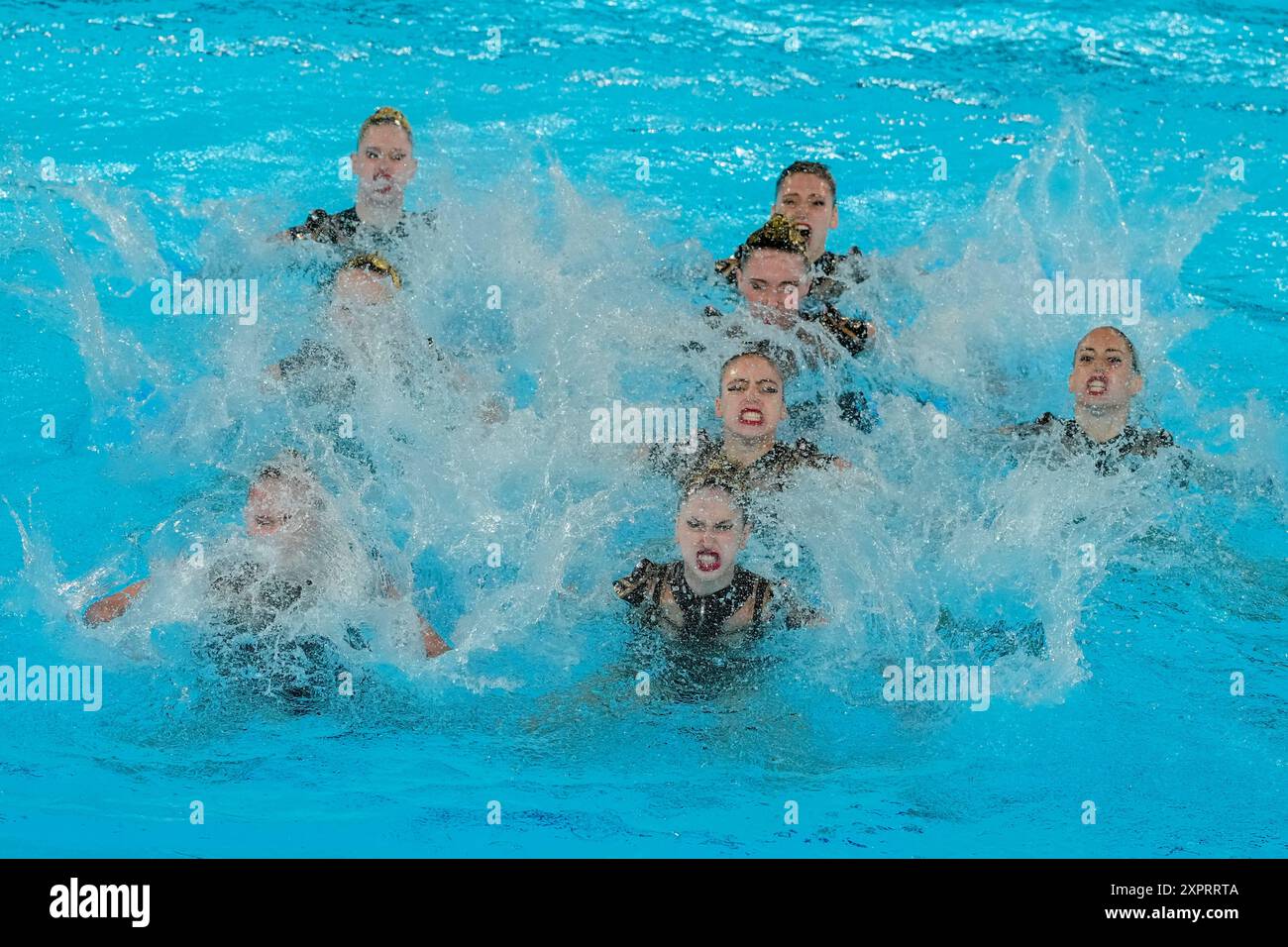 Team Spain competes in the team acrobatic routine of artistic swimming ...