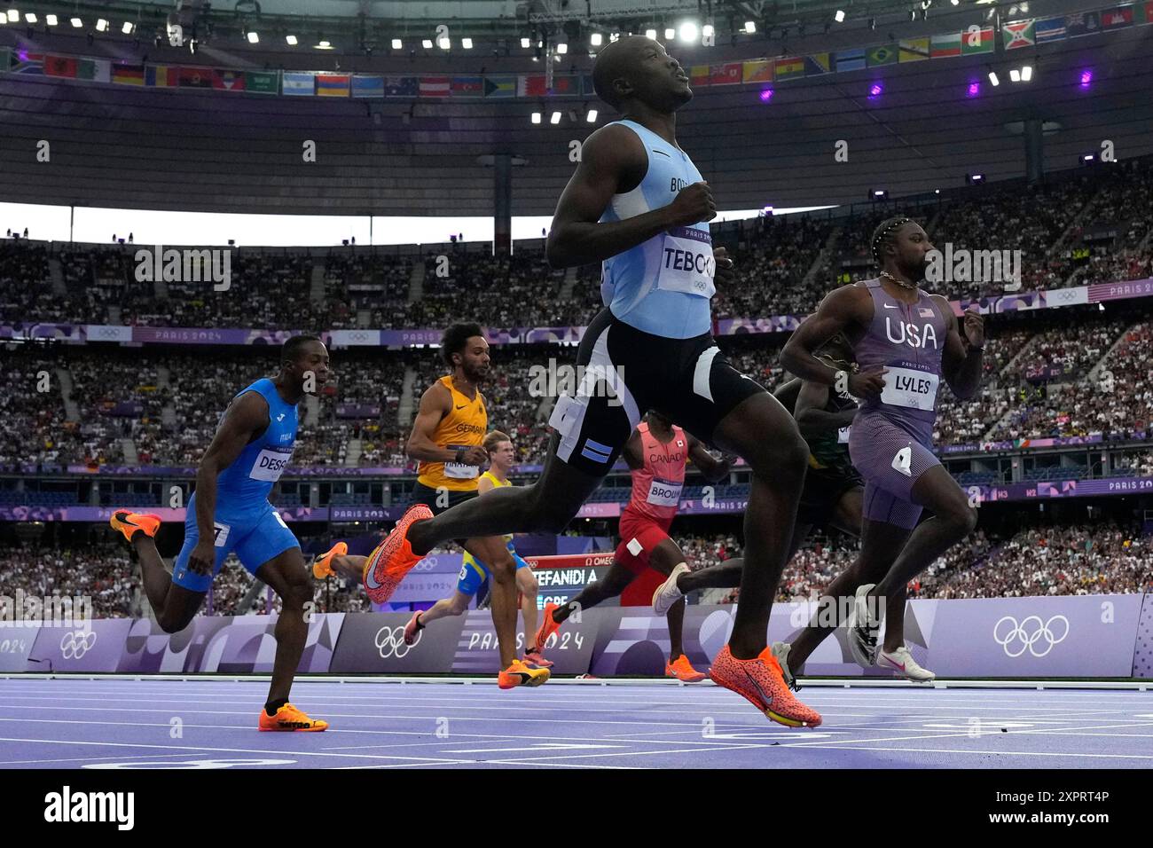Letsile Tebogo, of Botswana, leads Noah Lyles, of the United States, to ...