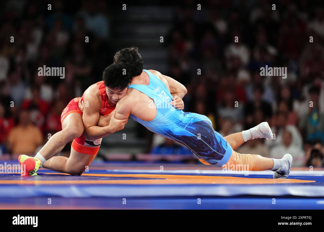 Japan's Nao Kusaka (left) and Kazakhstan's Demeu Zhadrayev during the ...
