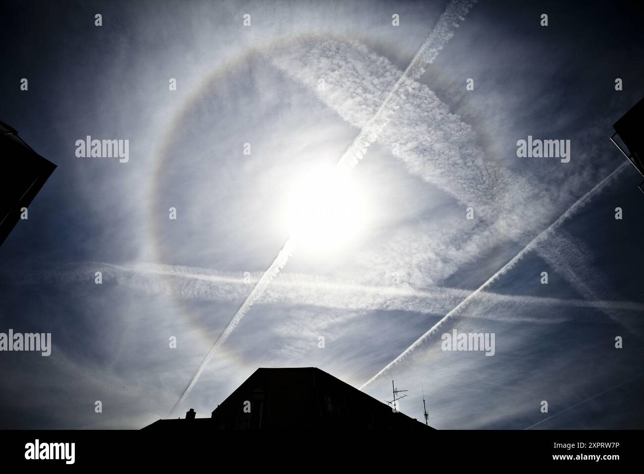 Rainbow circled halo around the sun in Berlin, Germany Stock Photo - Alamy