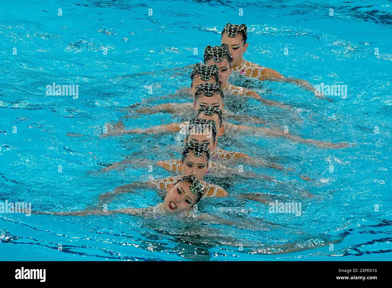 Team Japan competes in the team acrobatic routine of artistic swimming ...