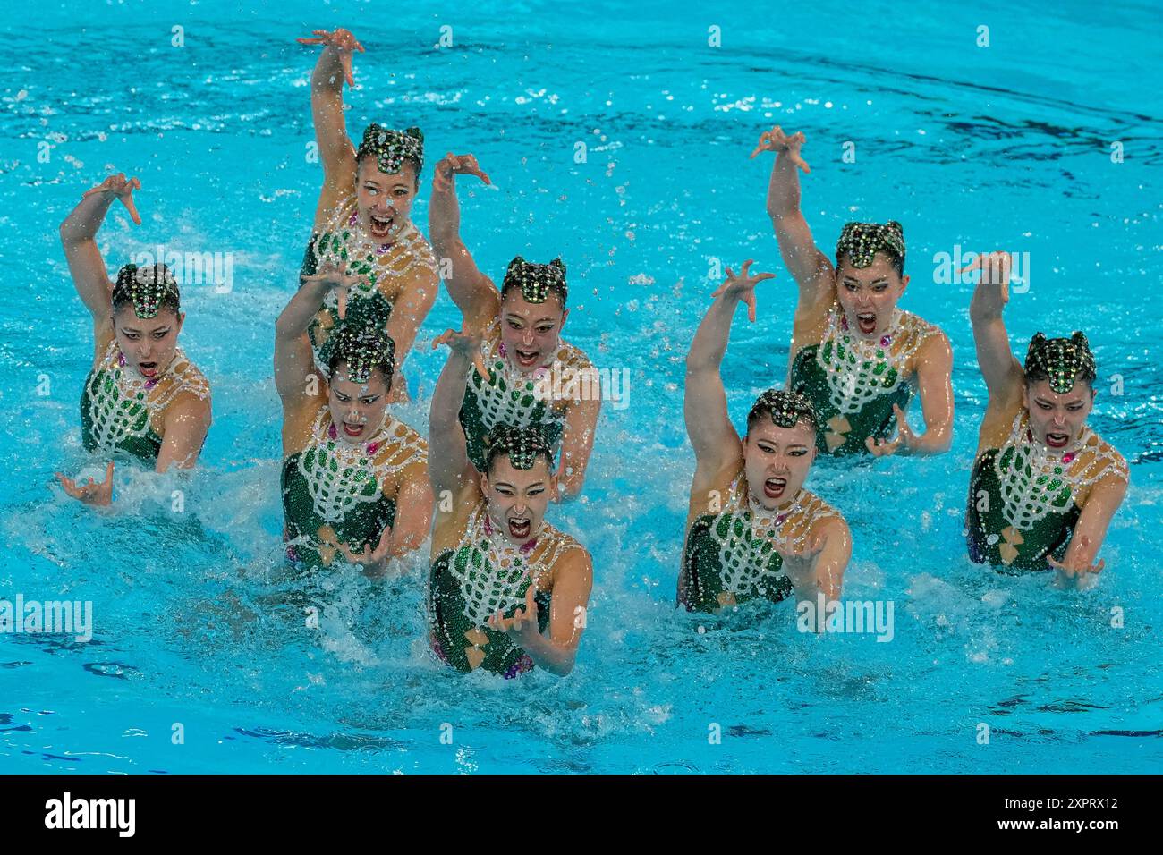 Team Japan competes in the team acrobatic routine of artistic swimming ...
