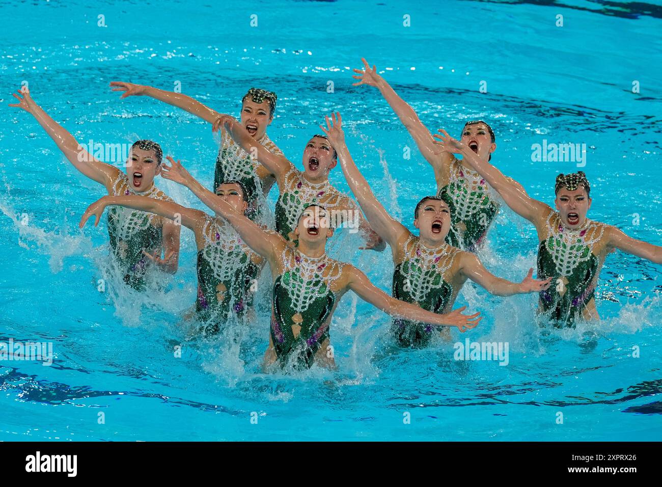 Team Japan competes in the team acrobatic routine of artistic swimming ...