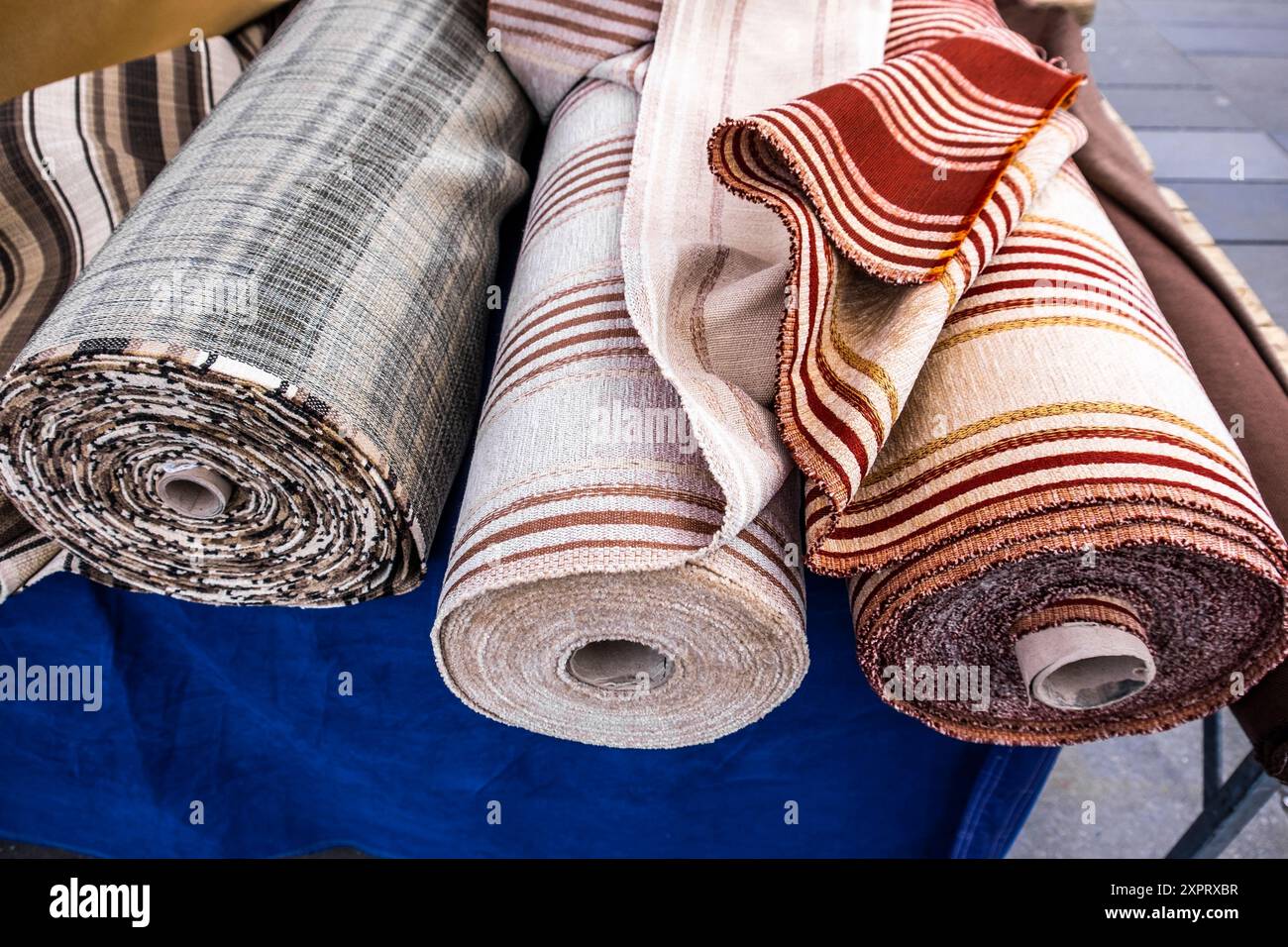 Composed roll shaped stacked fabrics at a Dutch market in Eindhoven,The ...