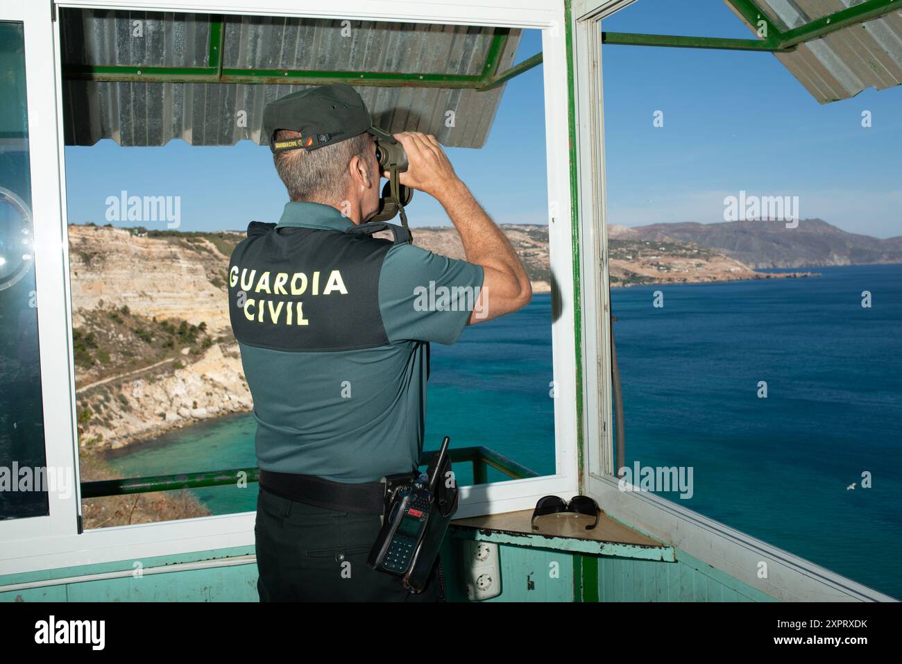 A Guardia Civil officer observing the European external border with ...
