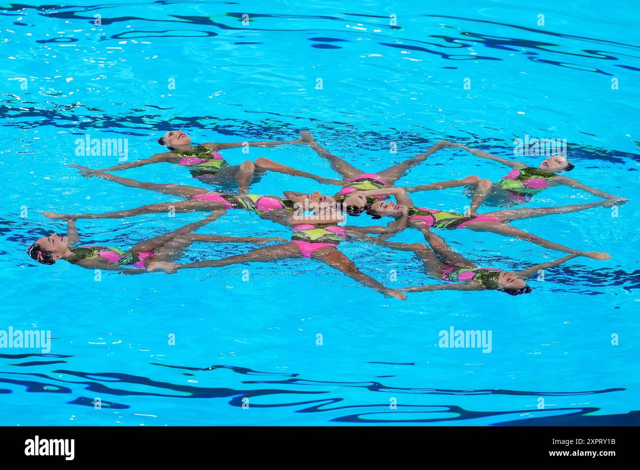 Team Mexico competes in the team acrobatic routine of artistic swimming ...