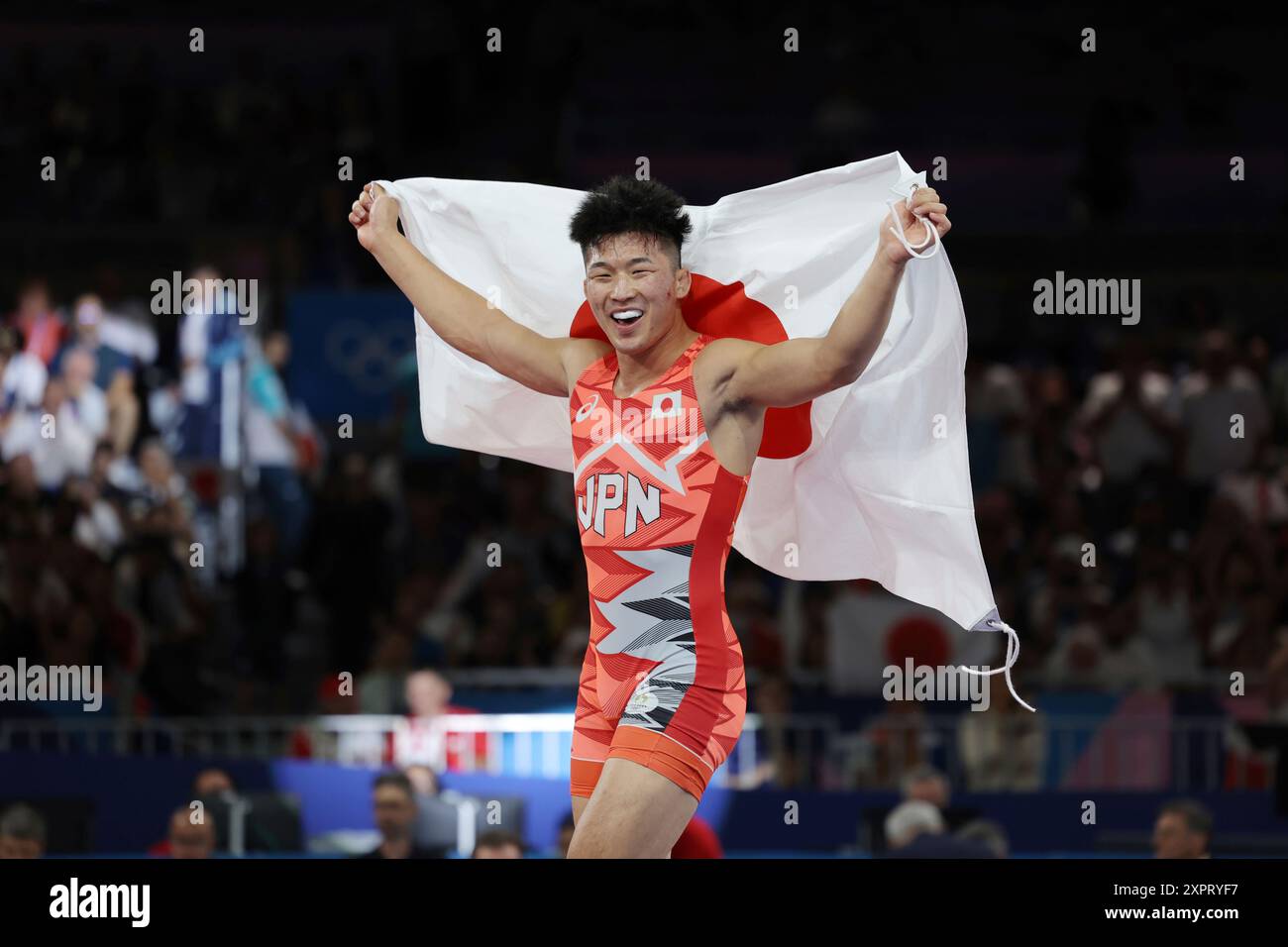 Japan's KUSAKA Nao celebrates after winning the Men's Greco-Roman 77kg ...