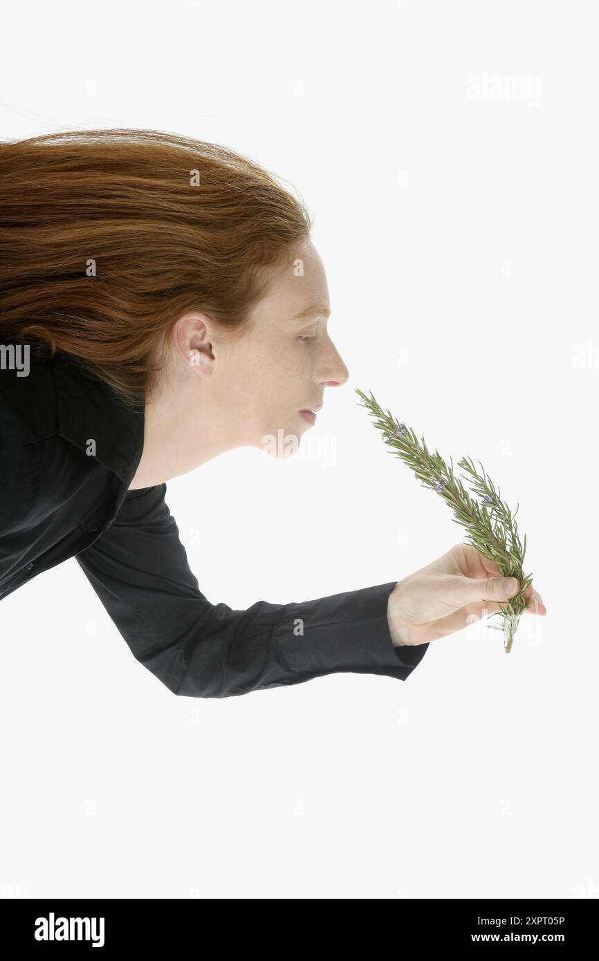 Woman smelling plants hi-res stock photography and images - Alamy