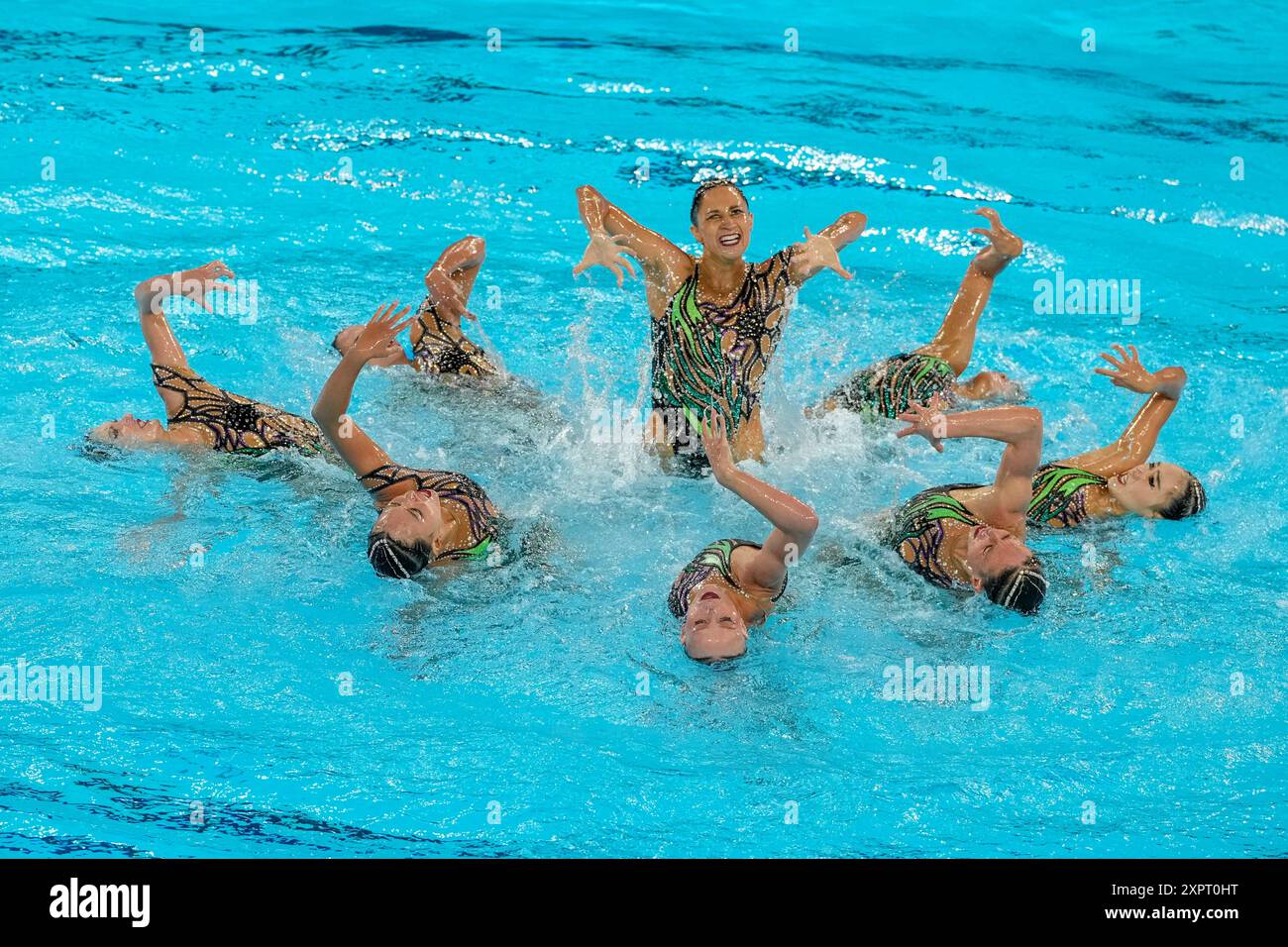 Team USA competes in the team acrobatic routine of artistic swimming at ...